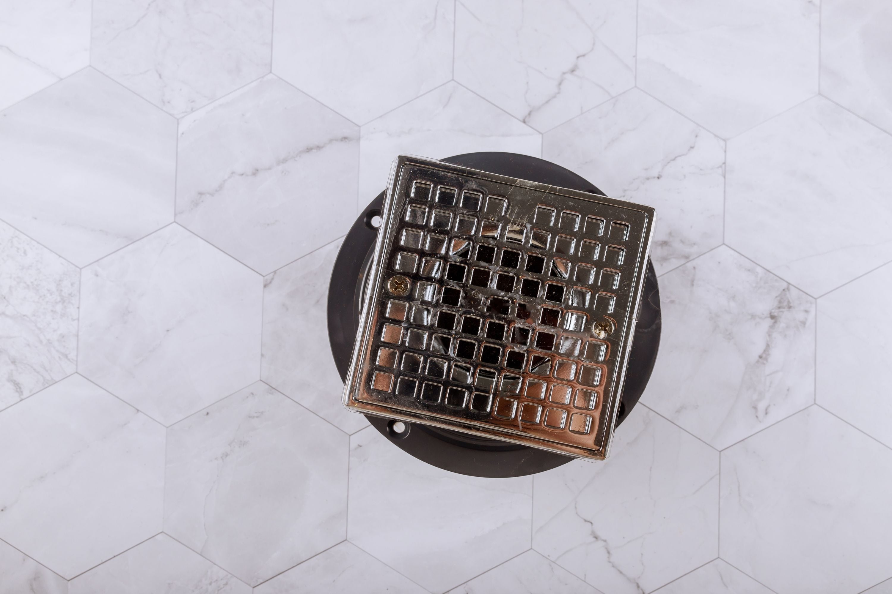 How to Unblock a Shower Drain - Swans Plumbing